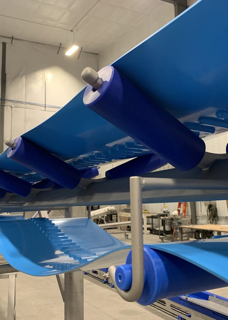 Dairy Sanitary Conveyors & Handling Equipment – PFI